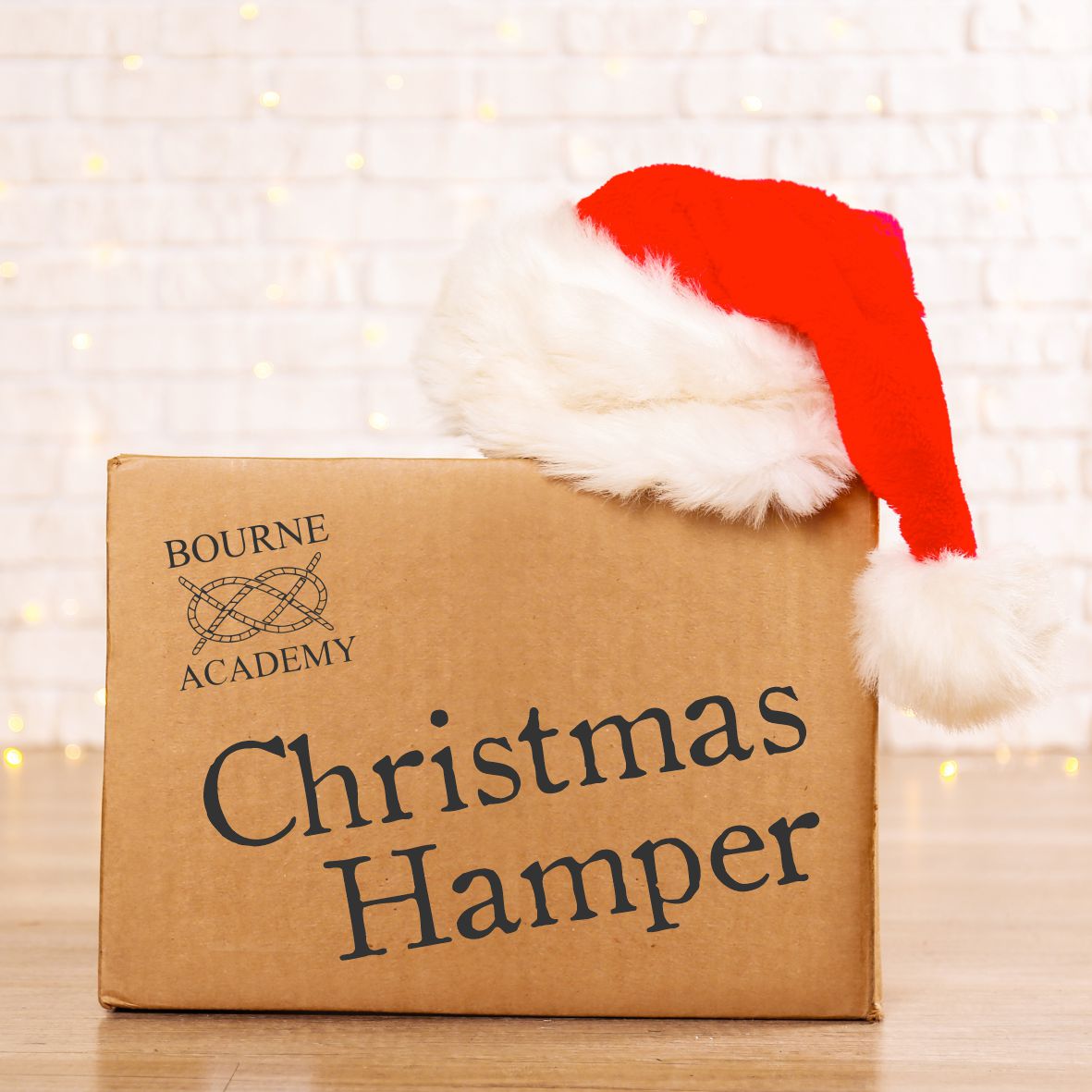 Donating Christmas Hampers to the local day care centre and foodbank – Bourne Academy